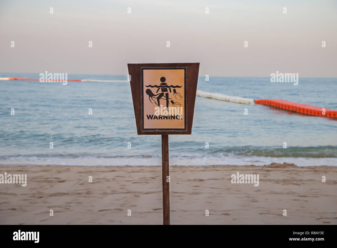 Jellyfish sting warning sign the danger zone at beach Stock Photo - Alamy