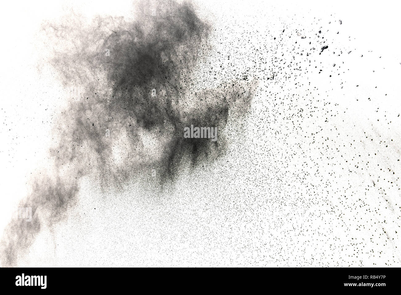 Black powder explosion against white background. Charcoal dust particle ...