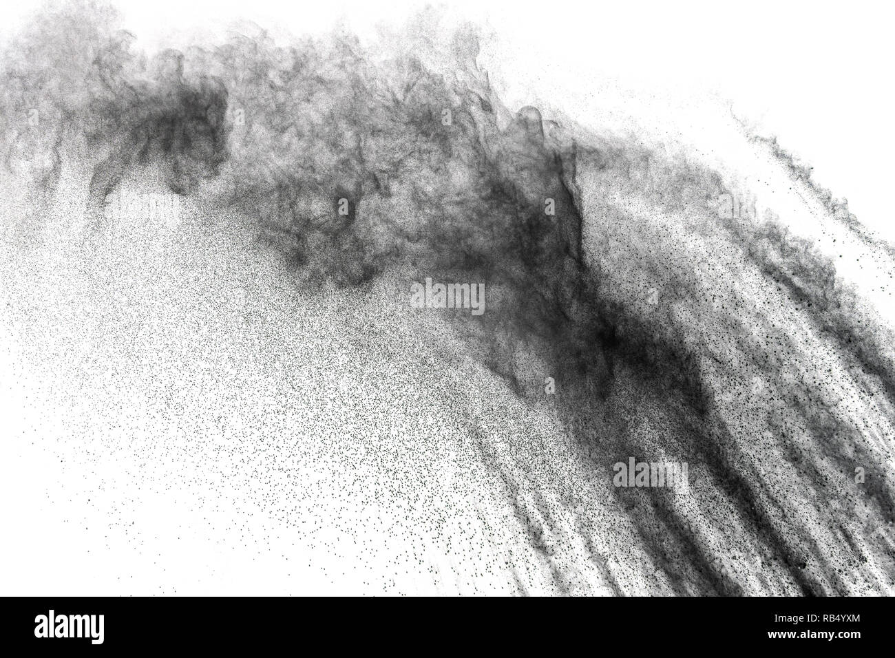 Black powder explosion against white background. Charcoal dust particle ...
