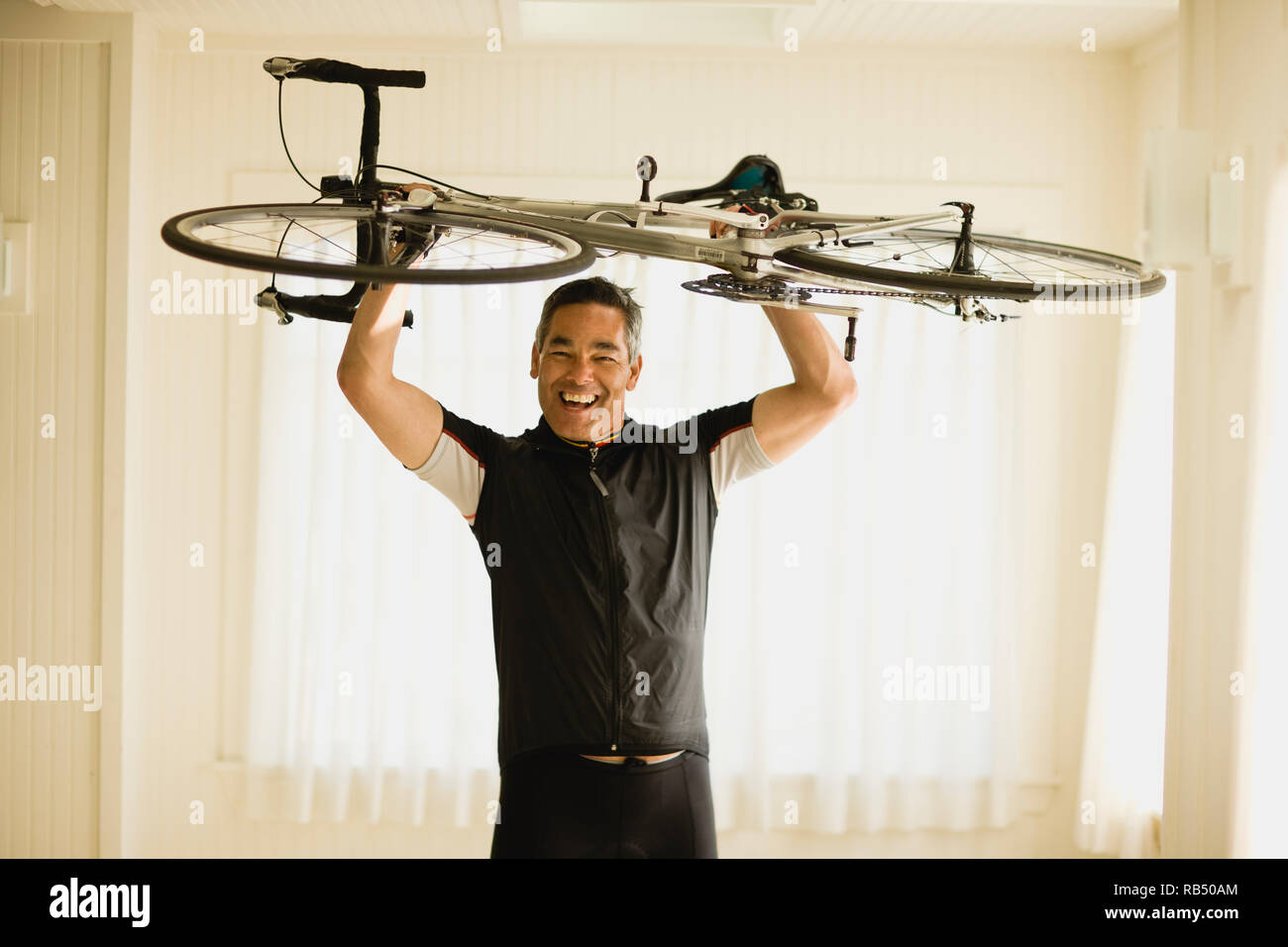 Lifting bikes hi-res stock photography and images - Alamy