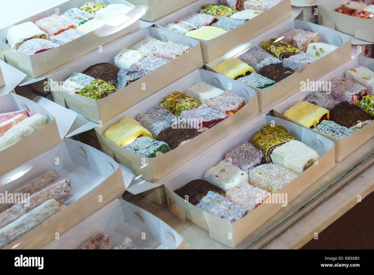 Eastern sweets Turkish delight and nougat with nuts and pistachios in ...