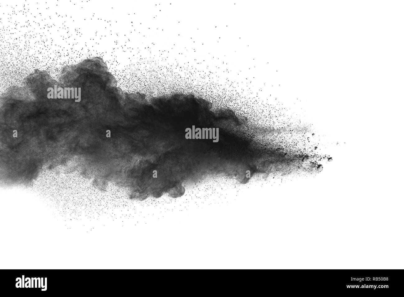 Black powder explosion against white background. Charcoal dust particle ...