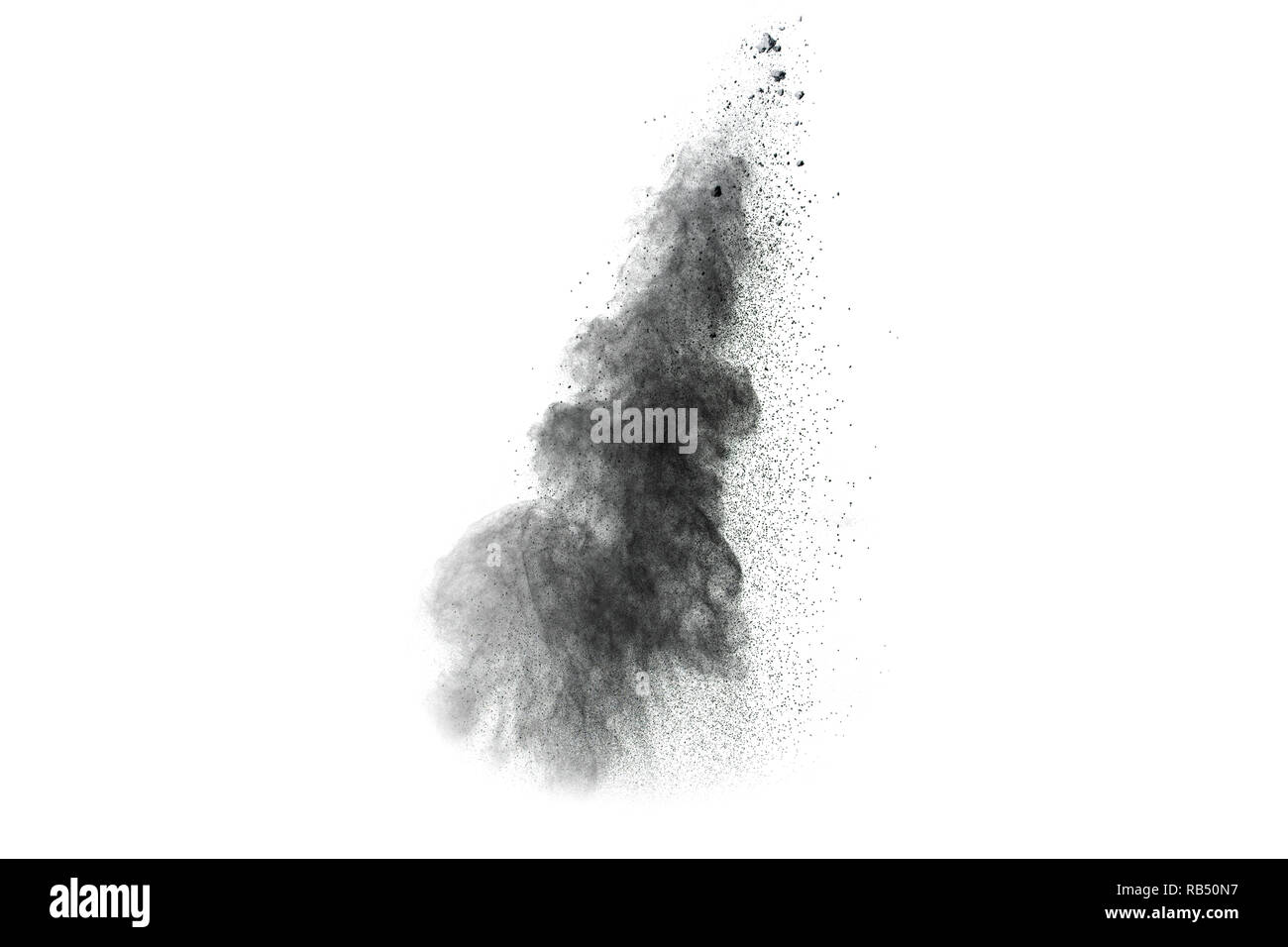 Black powder explosion against white background. Charcoal dust particle ...