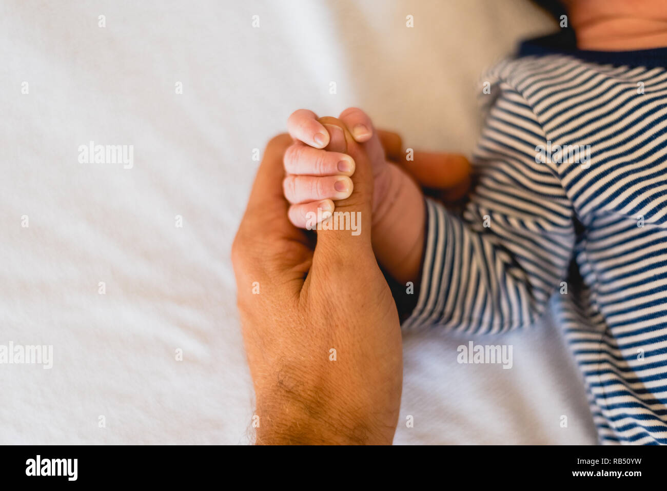 Small hands and fingers of newborn baby Stock Photo - Alamy