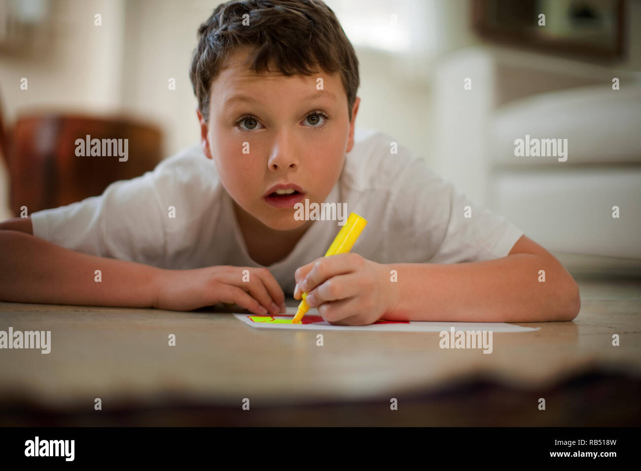 Boy colouring picture hi-res stock photography and images - Alamy