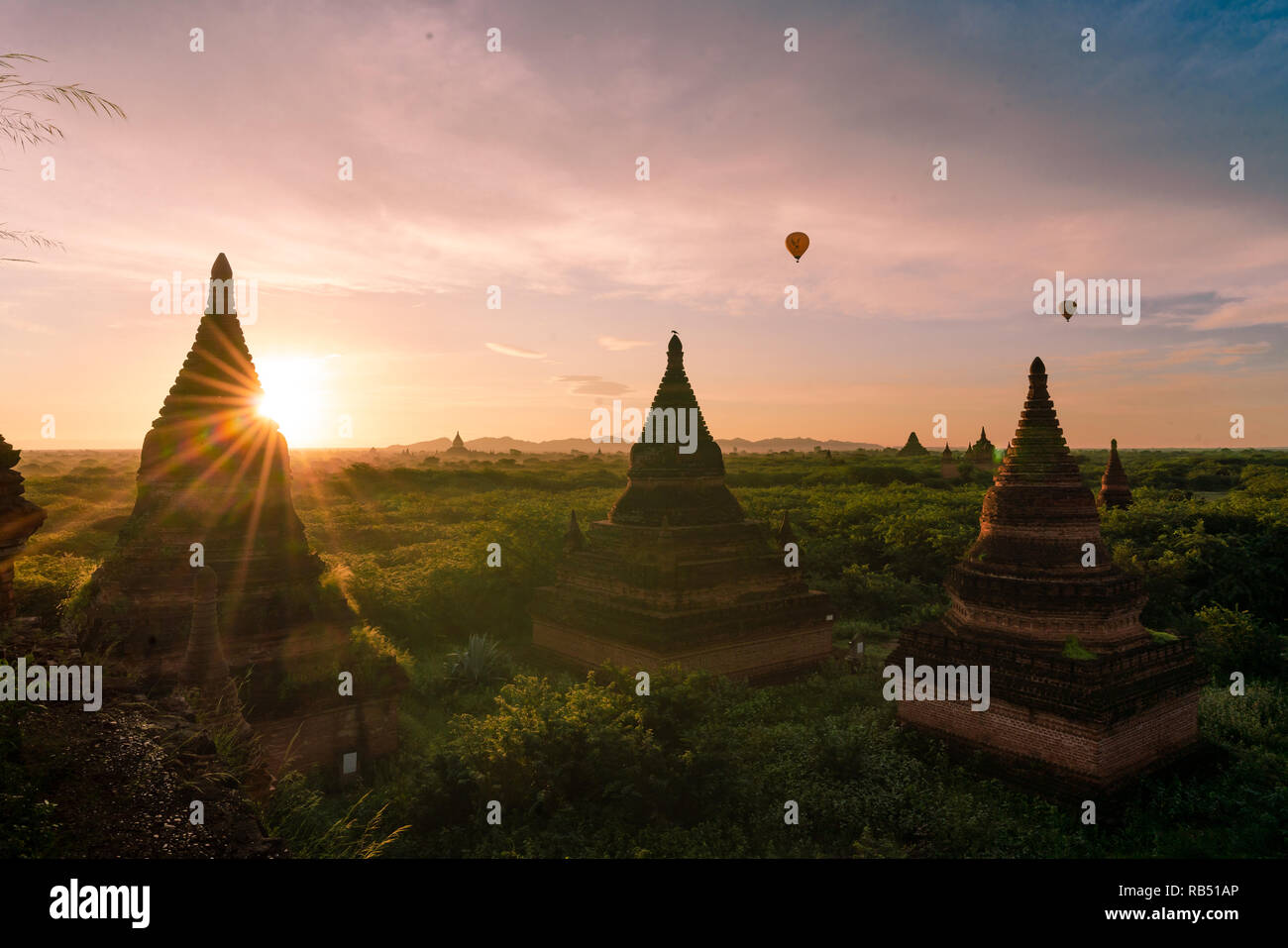 Amazing sunrise in Bagan with balloons on the horizon Stock Photo - Alamy