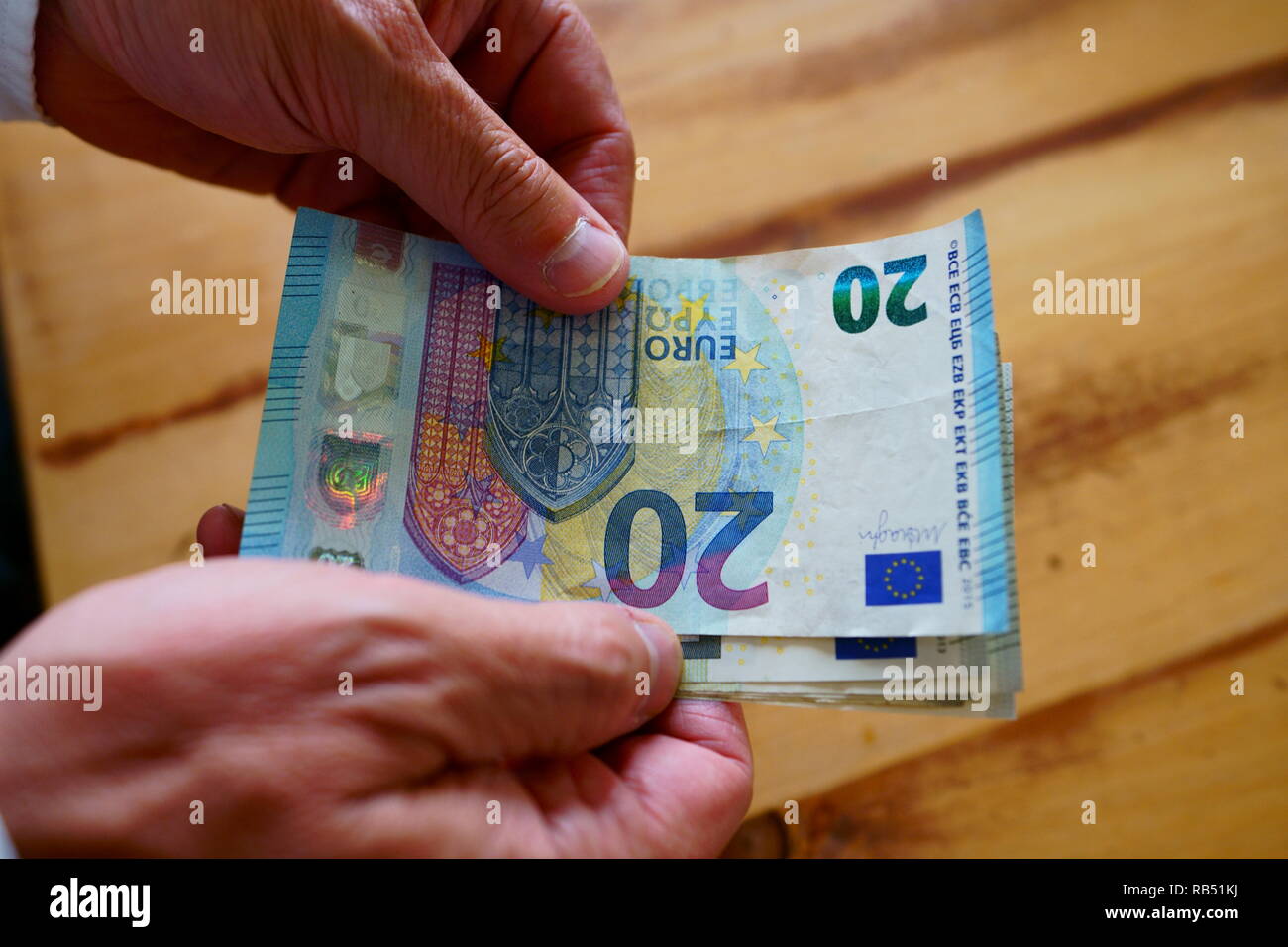 Money spread on table hi-res stock photography and images - Alamy
