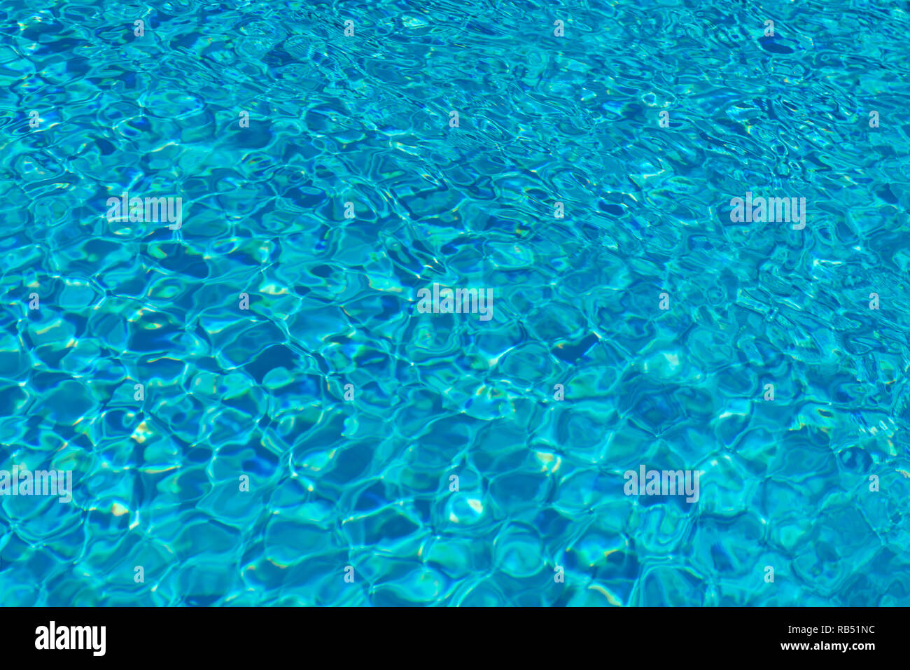 Blue water in swimming pool background. Ripple Water in swimming pool ...