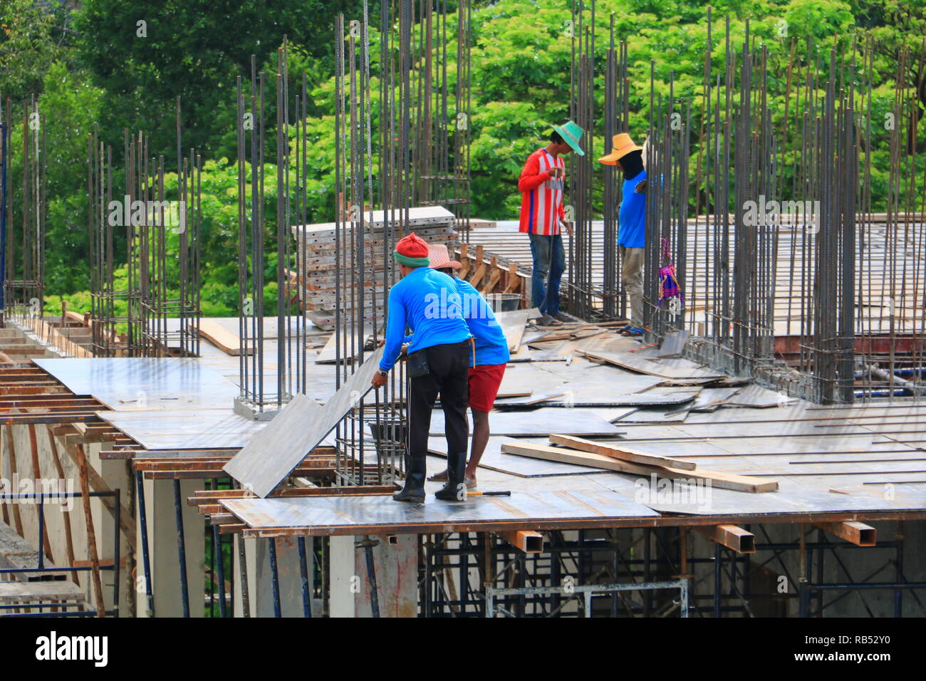 worker construction team working on high ground building commercial in ...