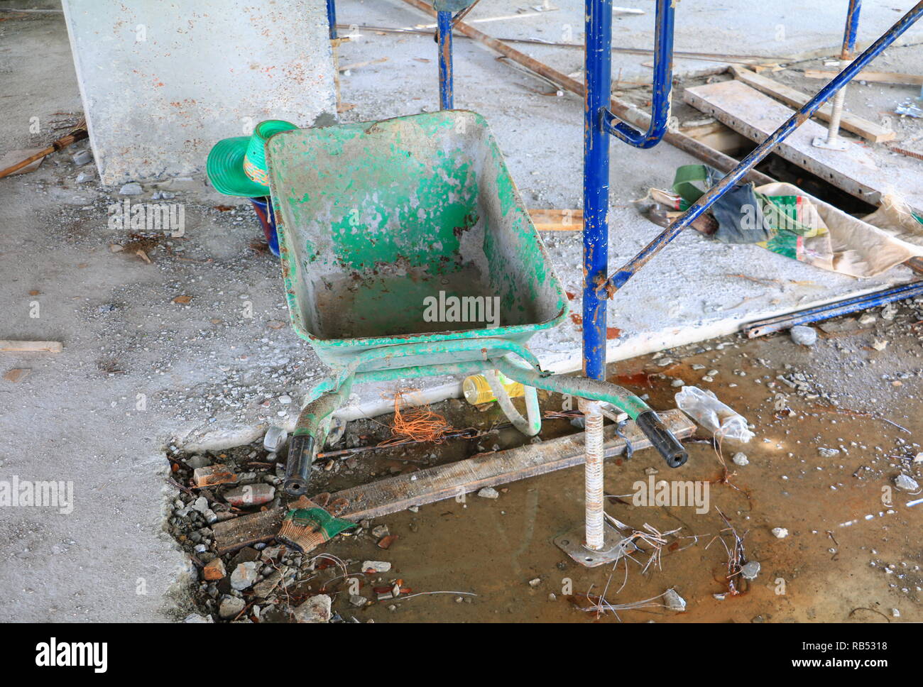 wheelbarrow in work construction site building Stock Photo - Alamy