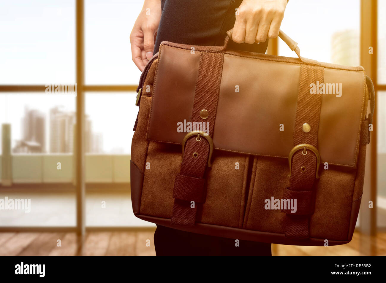 Business woman carrying a briefcase to her office Stock Photo - Alamy