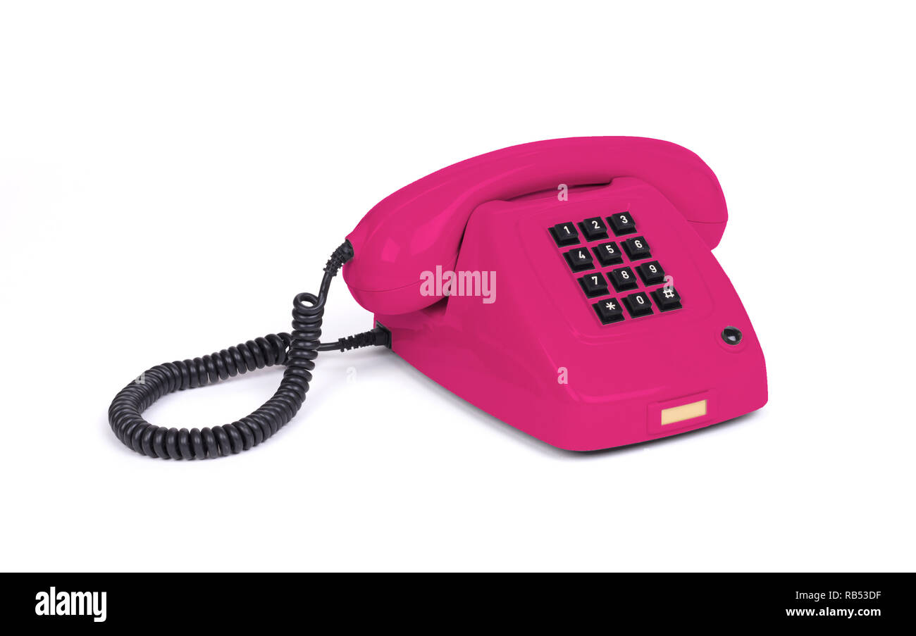 Vintage pink telephone with a white background Stock Photo - Alamy