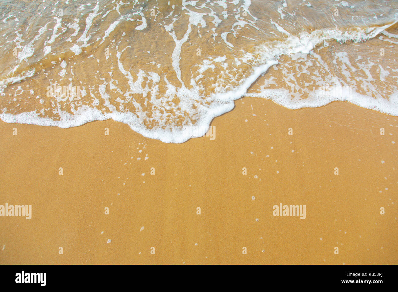 sand and wave background Stock Photo - Alamy