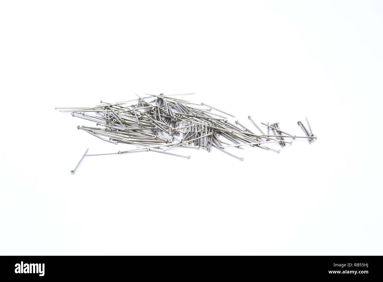 Picture of many pin. Isolated on the white background Stock Photo - Alamy