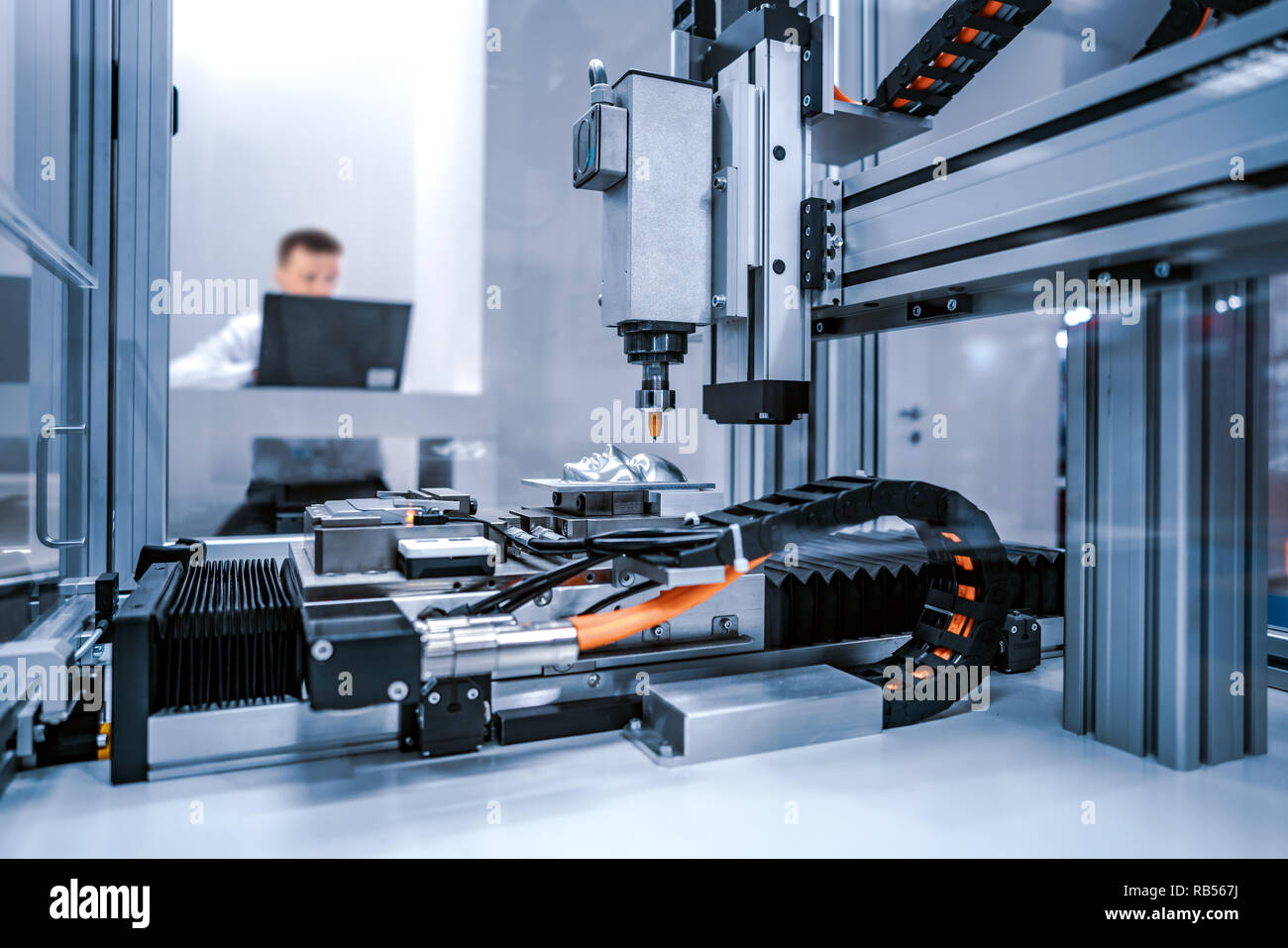 CNC Laser cutting of metal, modern industrial technology. Small depth ...