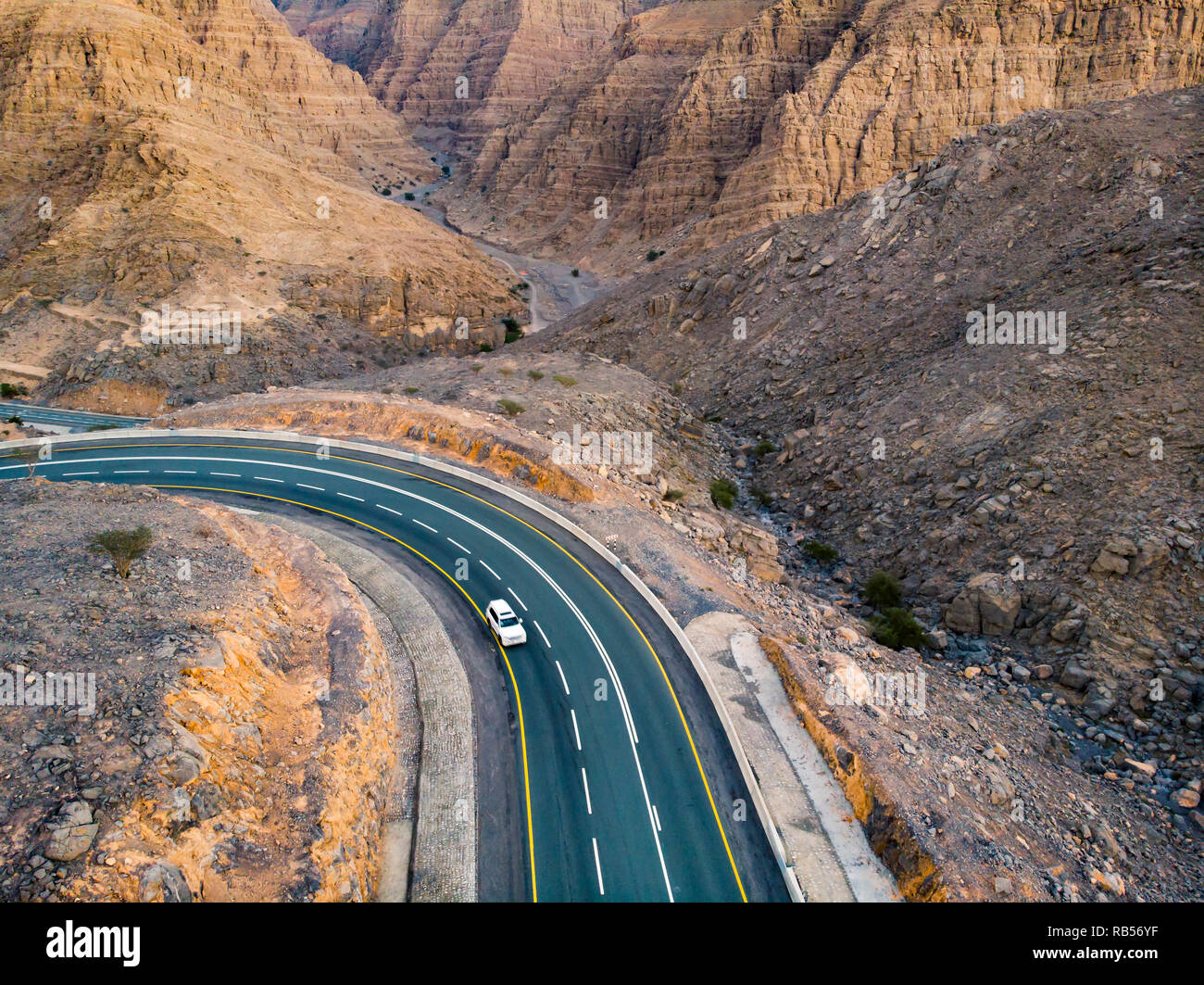 Jebal Jais winding desert mountain road in the United Arab Emirates ...
