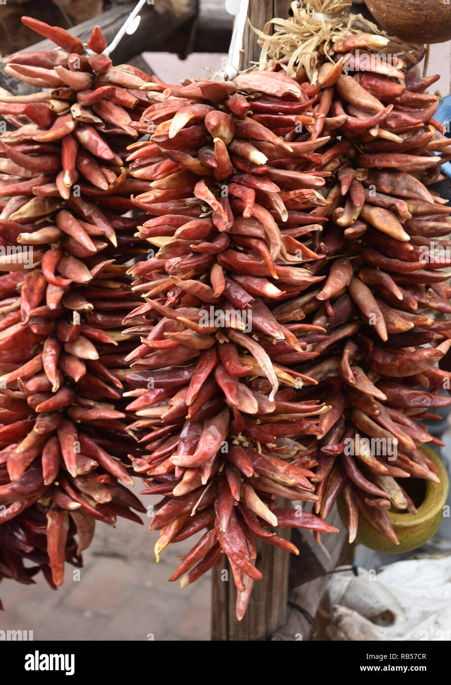 Red chili peppers drying in the sunshine Stock Photo - Alamy