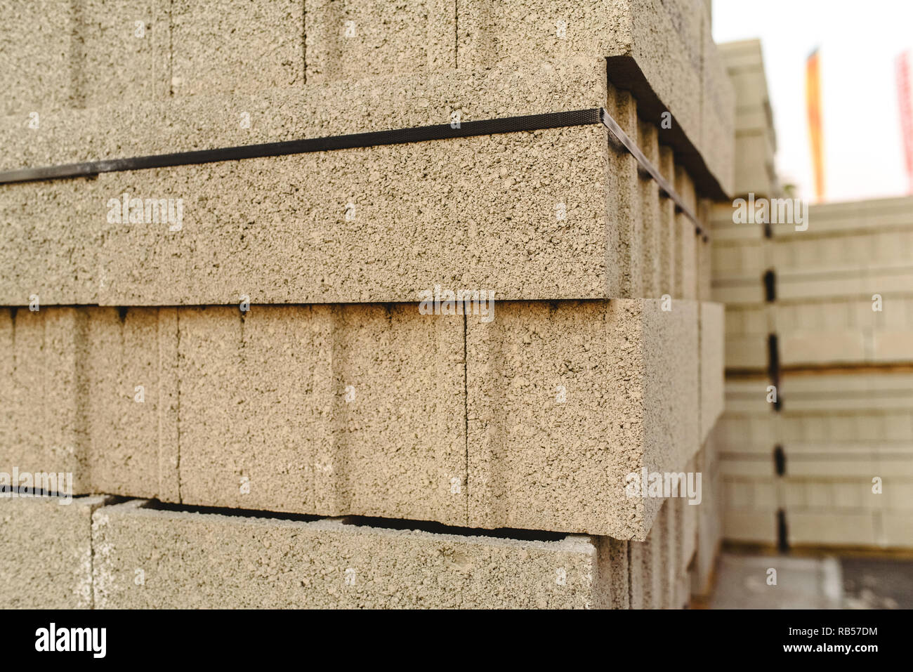 Brick pallets ready to build buildings by bricklayers Stock Photo - Alamy