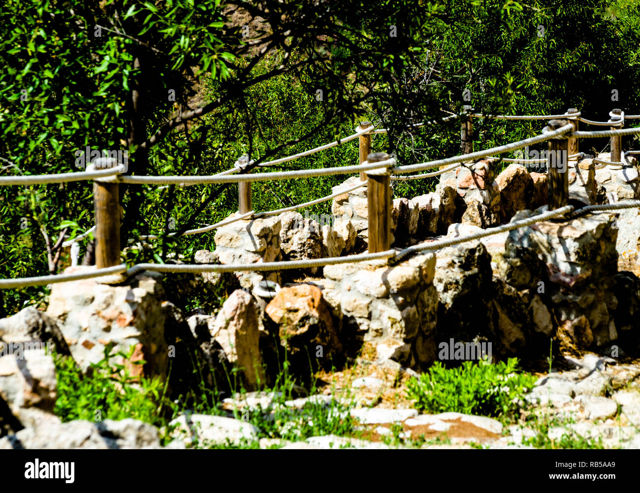 tourist path in a mountainous Spanish town, a pedestrian trail secured ...