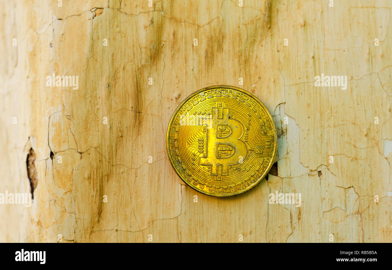 Crypto currency Gold Bitcoin, BTC, macro shot of Bitcoin coins on old ...