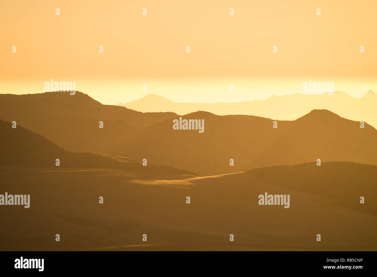 Sunset over the Namib Desert in Namibia Stock Photo - Alamy