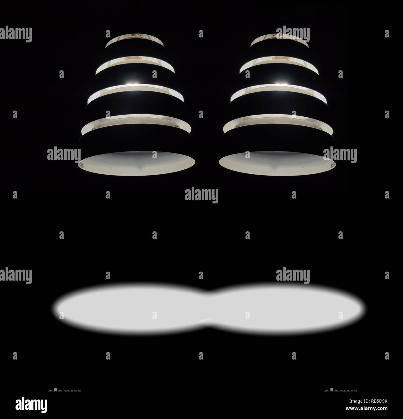 Bright lamps in darkness make bright ellipse place on the desk Stock ...