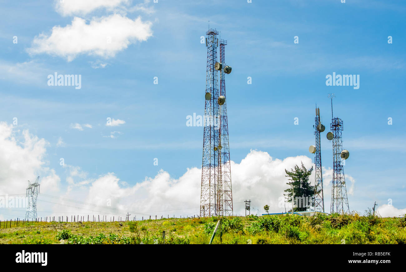 Telecommunication equipment on a blue sky background. Directional ...