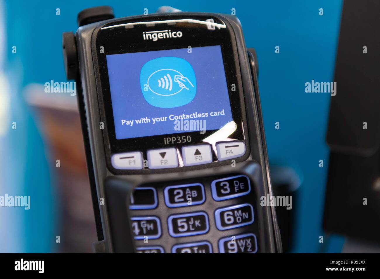 A contactless chip and pin payment terminal in a supermarket shop in ...