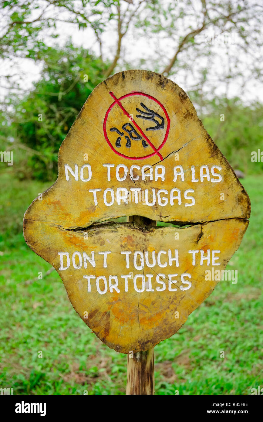 GALAPAGOS, ECUADOR- NOVEMBER, 11 2018: Outdoor view of informative sign ...