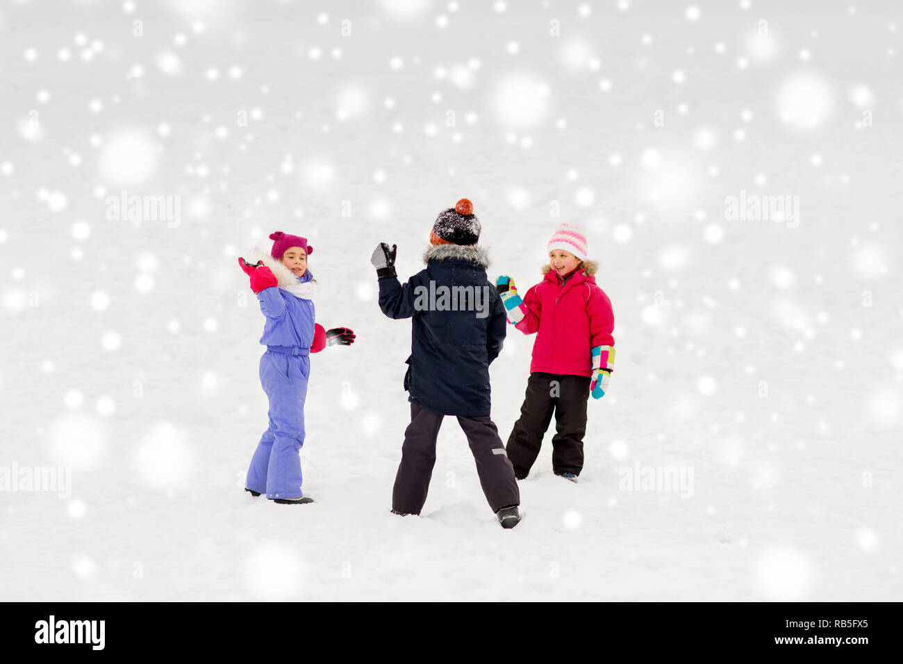 happy little kids playing outdoors in winter Stock Photo - Alamy