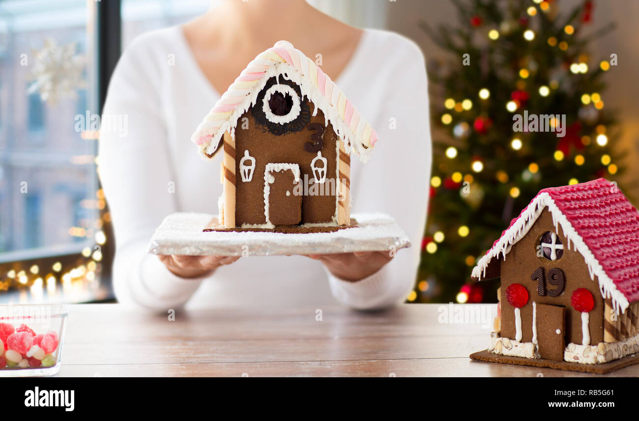 Woman glazing traditional gingerbread hi-res stock photography and ...