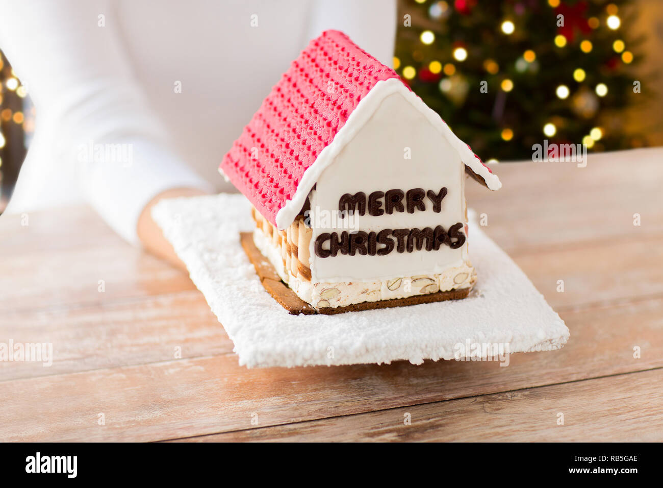 Woman glazing traditional gingerbread hi-res stock photography and ...