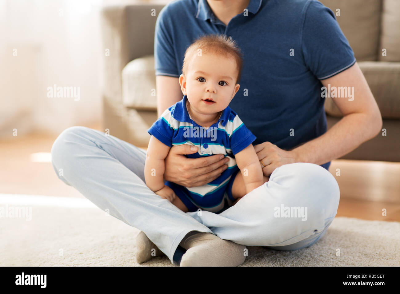 baby boy with father at home Stock Photo - Alamy