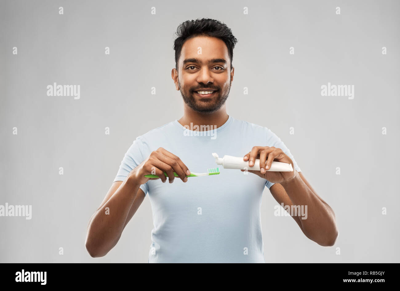 indian man with toothbrush and toothpaste Stock Photo - Alamy