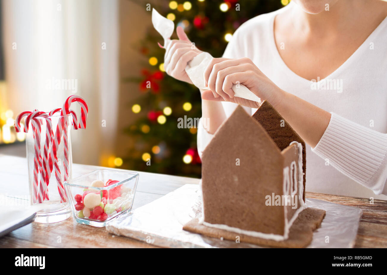 Woman glazing traditional gingerbread hi-res stock photography and ...