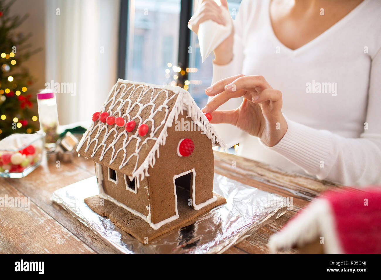 Process making gingerbread house hi-res stock photography and images ...