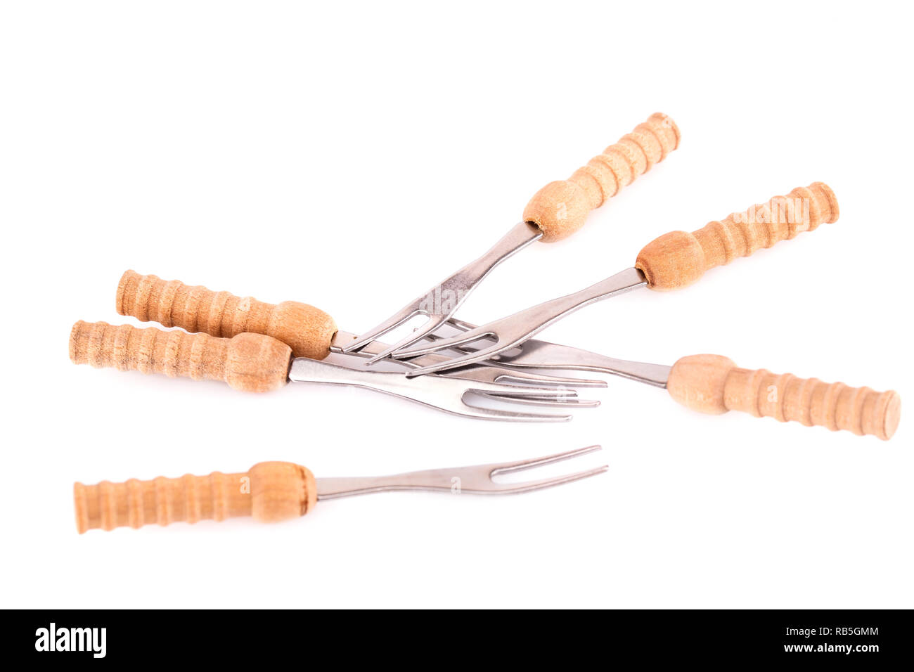 Forks with wooden handles isolated on white background Stock Photo - Alamy