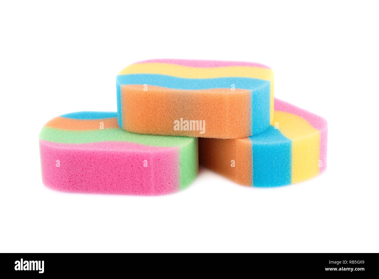Colorful sponges isolated on white background Stock Photo - Alamy