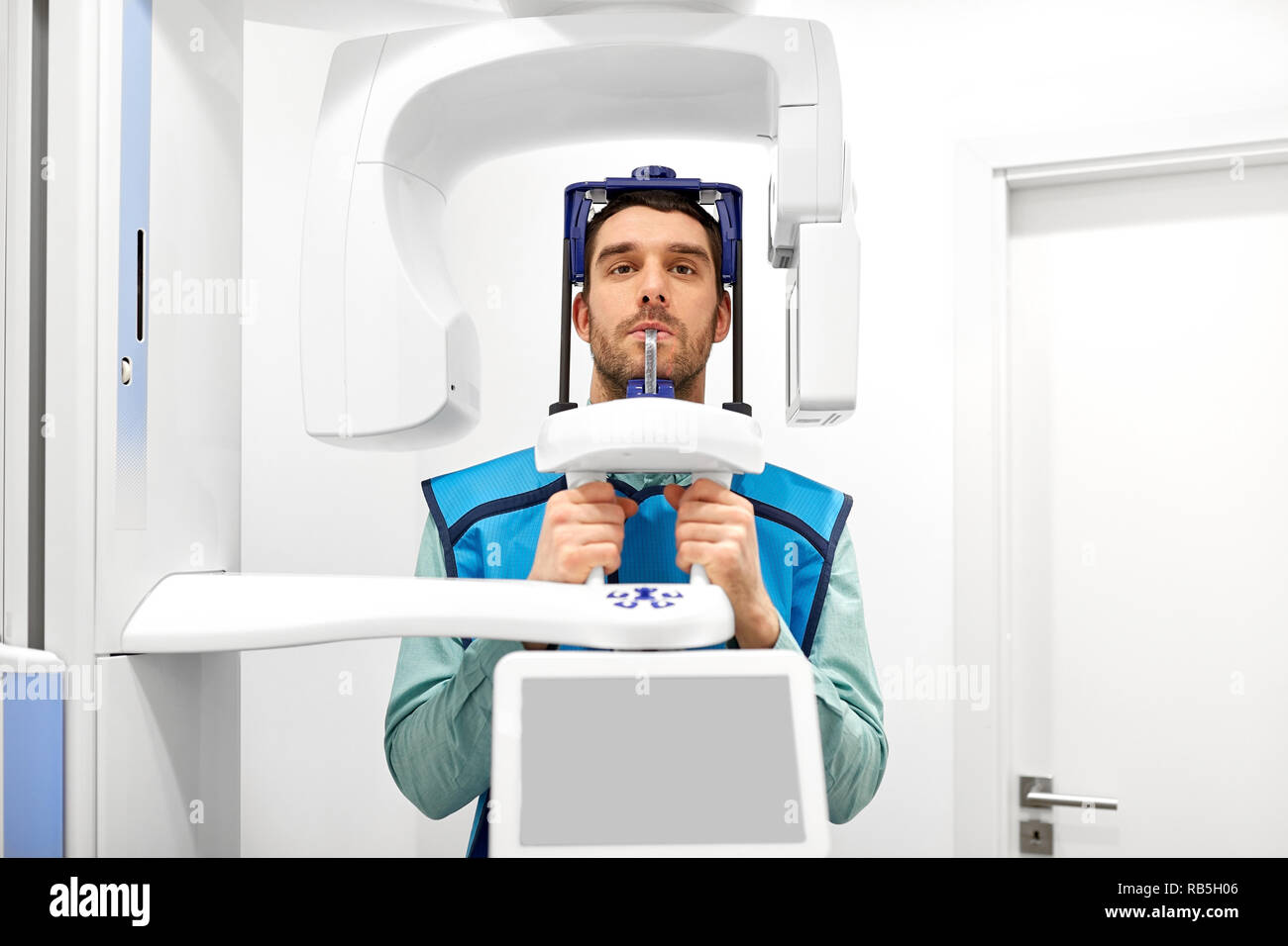 patient having x-ray scanning at dental clinic Stock Photo - Alamy