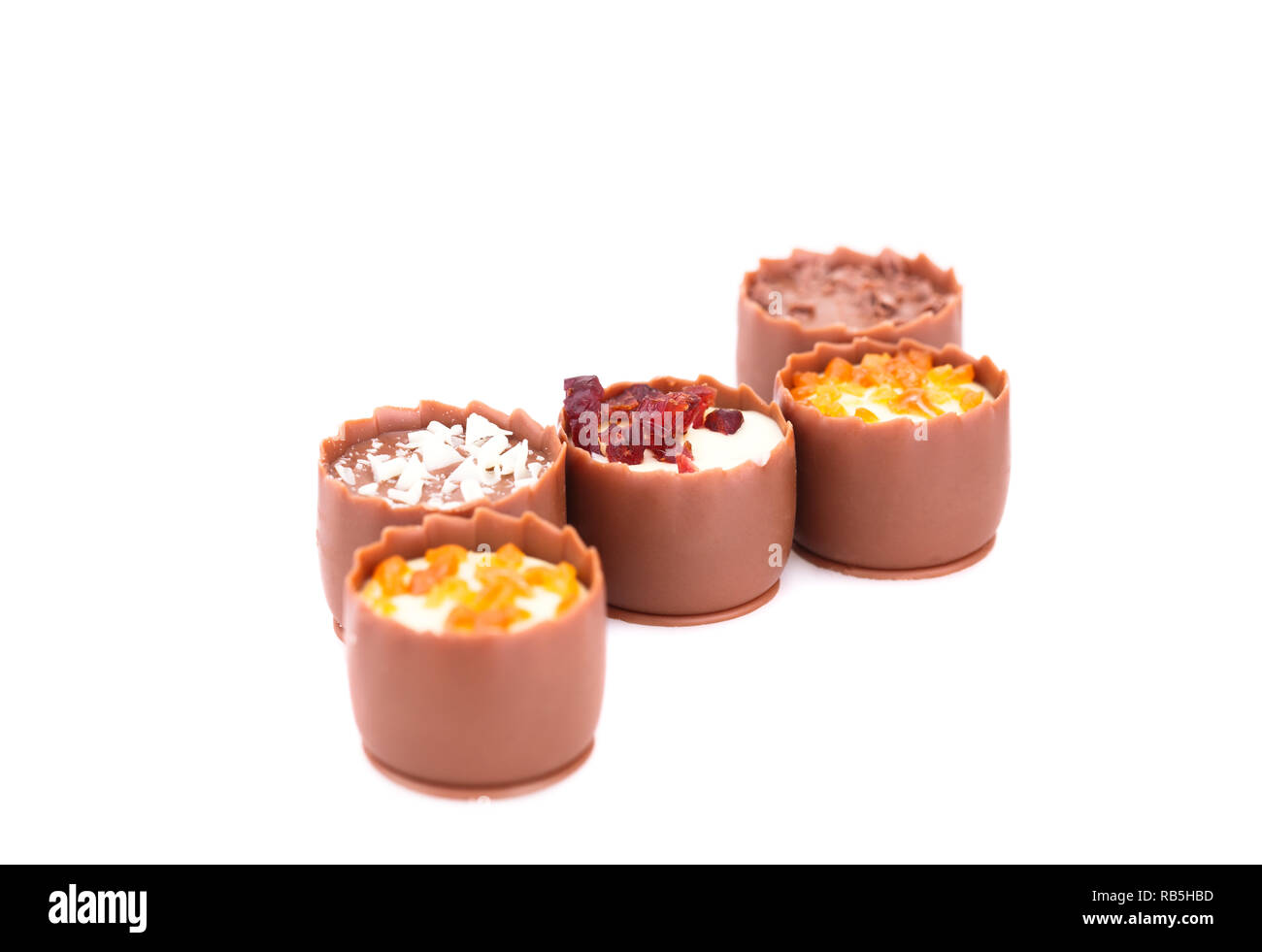 Heap of chocolate isolated on white background Stock Photo - Alamy