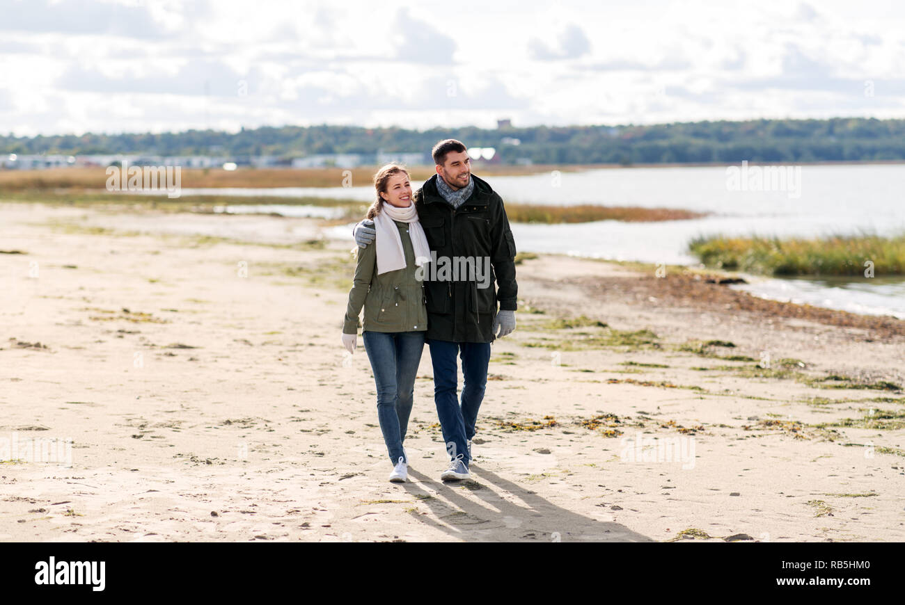 Young couple walking together along hi-res stock photography and images ...