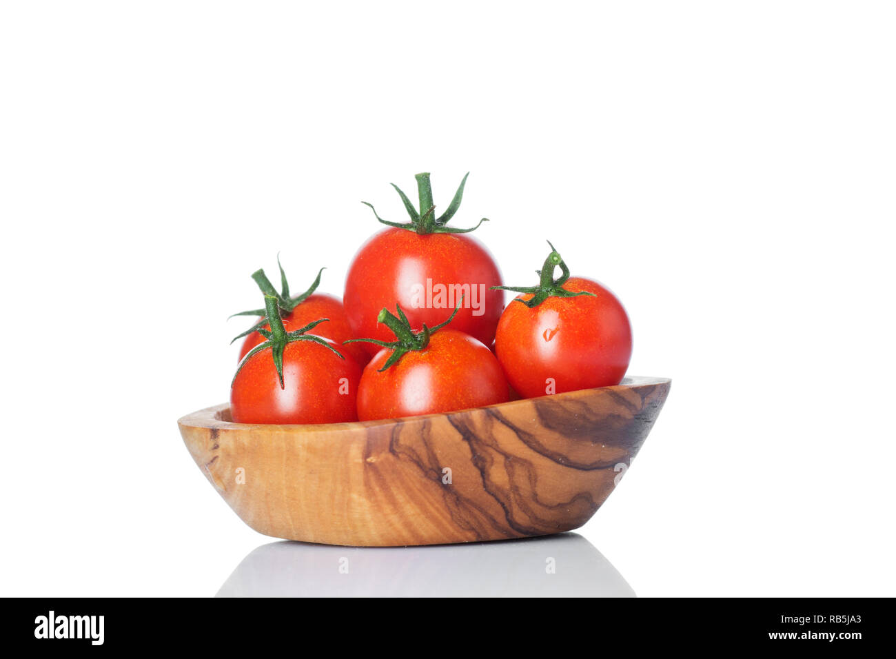 Fresh ripe tomatoes in wood bowl isolated on white background Stock ...