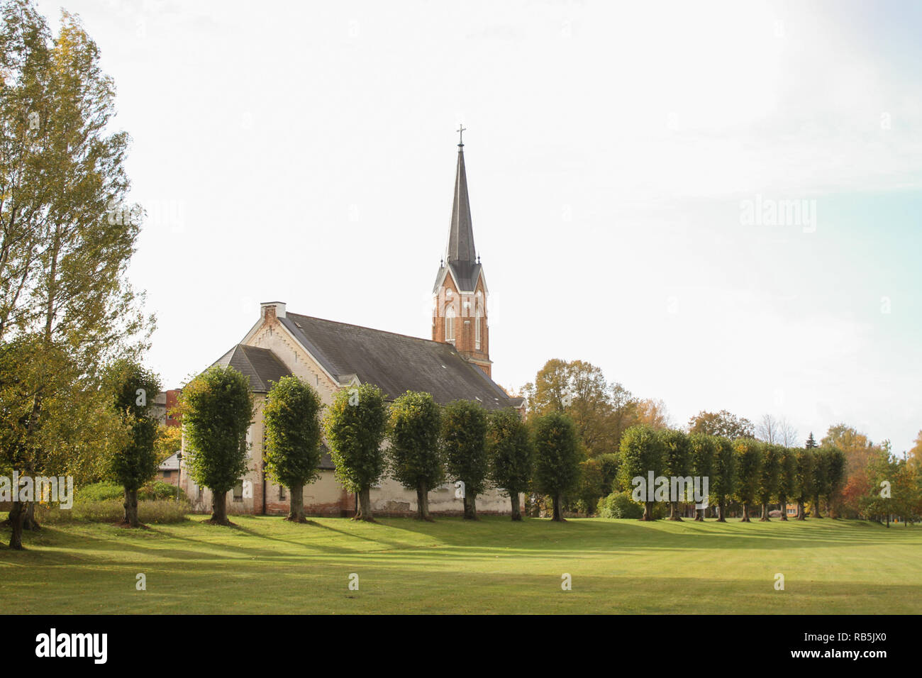 Beautiful, old, small church view in a small countryside village park ...