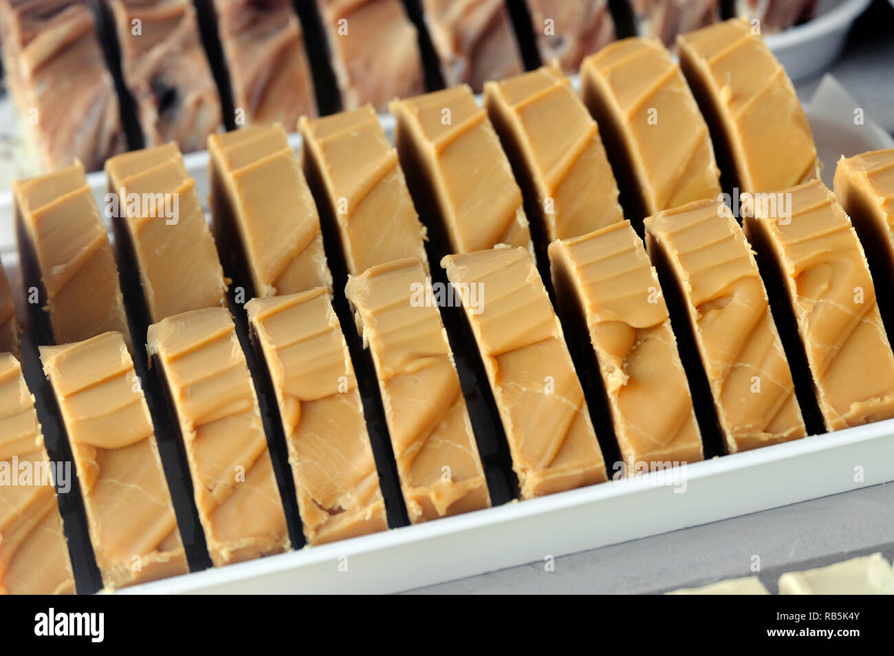 slices of salted caramel style fudge in shop window Stock Photo - Alamy