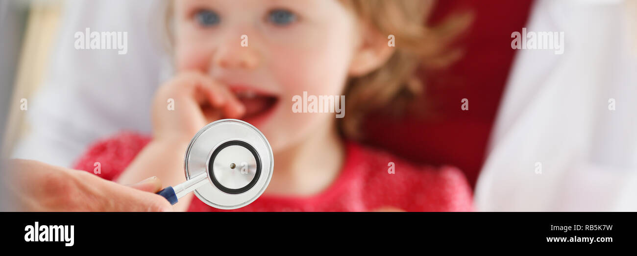 Little scared child at doctor reception Stock Photo - Alamy