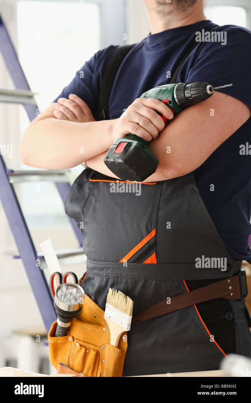 Hand hold electric screwdriver hi-res stock photography and images - Alamy