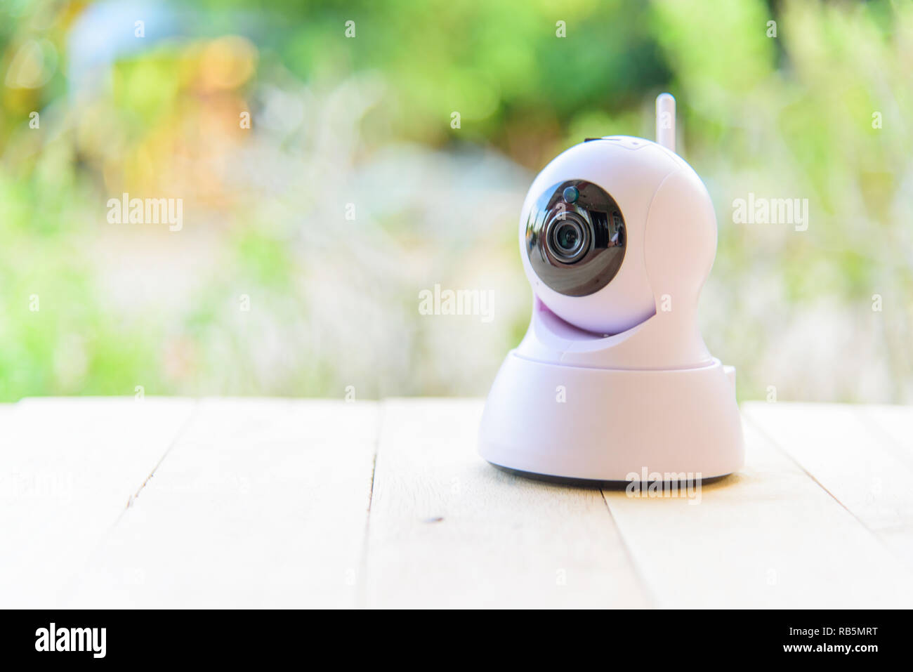cctv camera on wood plate Stock Photo - Alamy