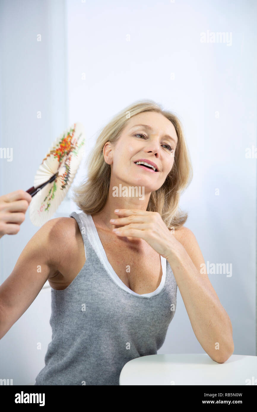 Woman hot fan 50 hi-res stock photography and images - Alamy