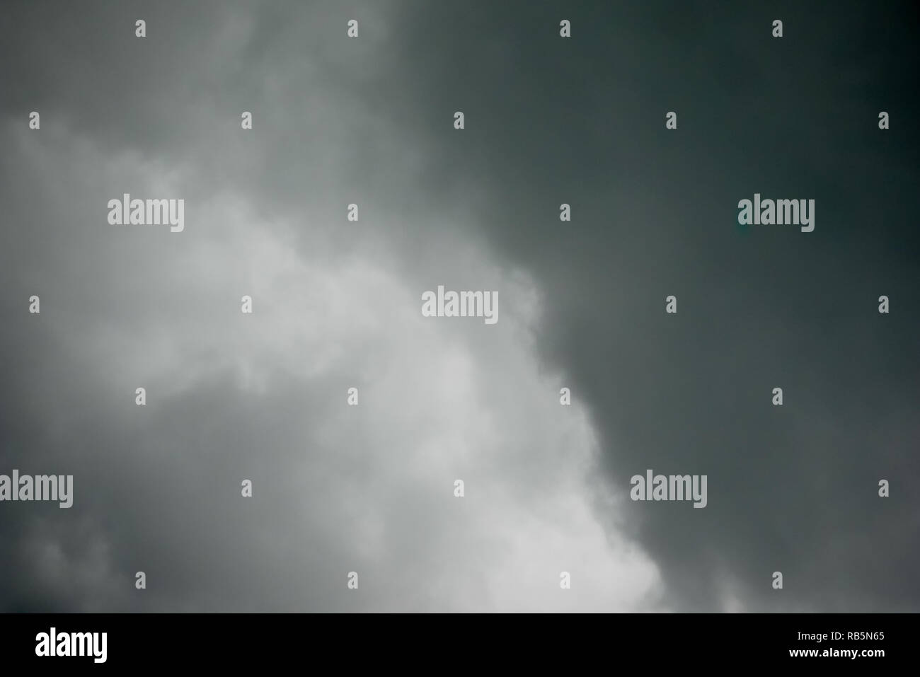 Heavy grey clouds in the sky before the rain - Image Stock Photo - Alamy