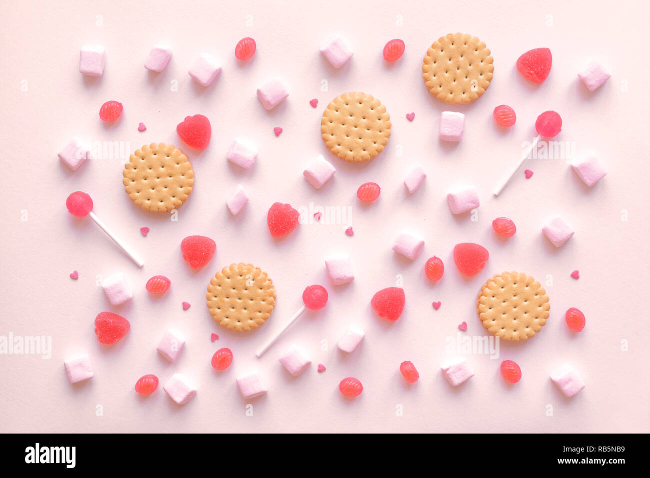 Pink candies, marshmallows and cookies pattern, background. Various ...